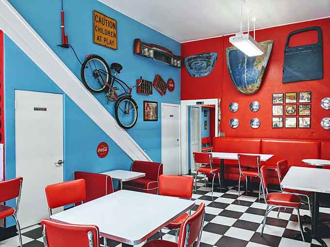 Inside, bright colors and checkered floors set the stage for serious ice cream decisions and even more serious enjoyment.