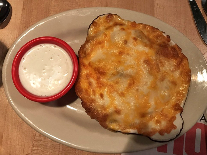 Crispy exterior gives way to molten cheese interior, with cooling ranch dip standing by for the inevitable heat emergency.