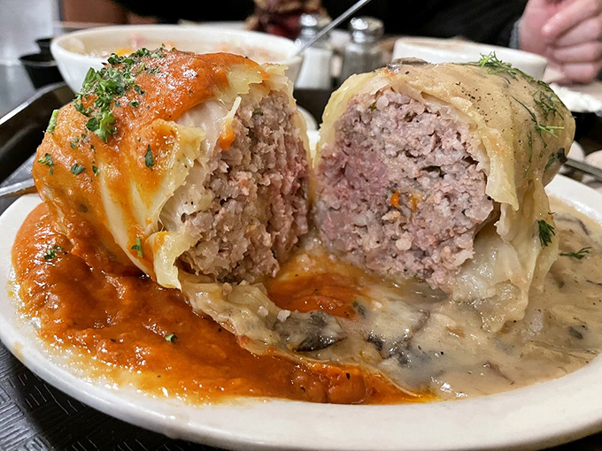 A masterpiece of Eastern European comfort food &ndash; this cabbage roll cradles seasoned meat and rice in a tender cabbage embrace, all bathed in a tomato sauce of remarkable depth.