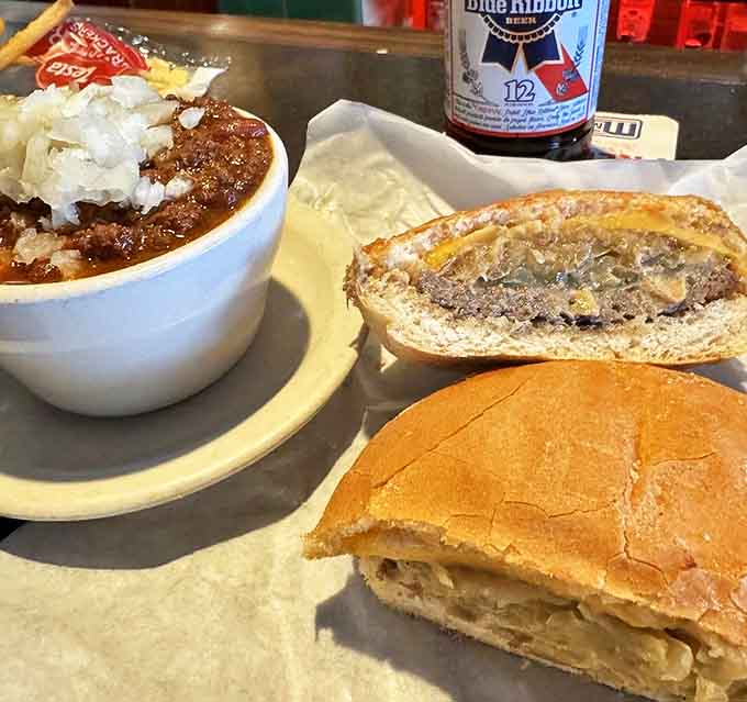 A classic cheeseburger paired with homemade chili creates the ultimate comfort food combination for any day.
