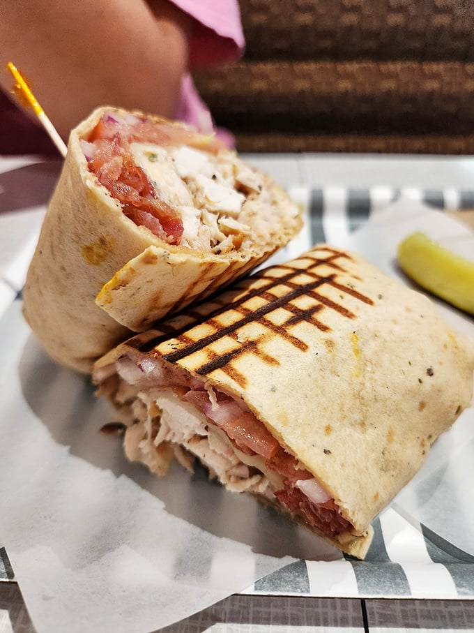Chicken bacon wrap mastery: Tightly wound, perfectly balanced, and secure enough to eat one-handed while gesturing wildly about its deliciousness with the other.