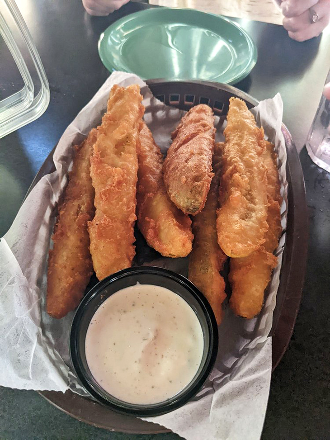 Pickle spears in their finest form &ndash; hand-breaded, fried to golden perfection, and served with a dipping sauce that complements their tangy crunch.