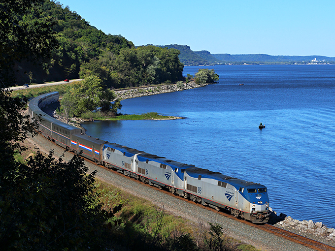 The Empire Builder glides along Lake Pepin, where the Mississippi widens into a natural lake of breathtaking beauty.