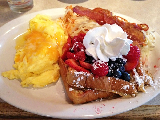 I Feel Fine French Toast: A berry-topped masterpiece that would make even Ringo drum with delight – fresh fruit and powdered sugar creating a sweet symphony.
