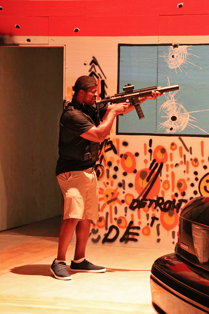 Tactical positioning is everything in the heat of battle. This player demonstrates perfect form while clearing a corner, something you'll quickly learn is essential for survival.