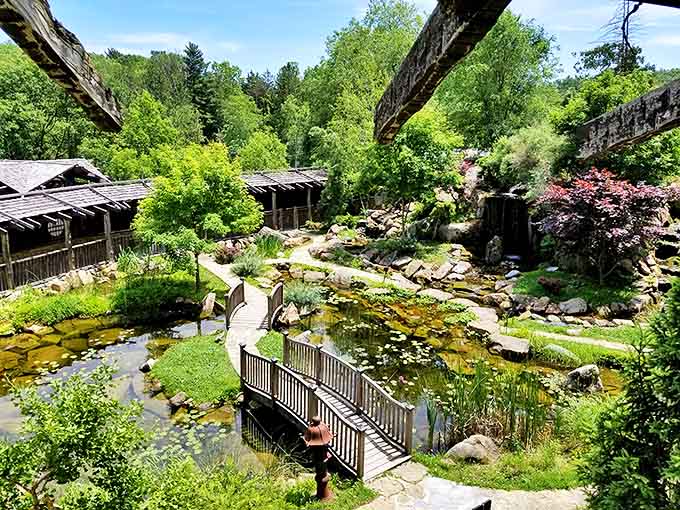 Tranquility finds its home in this Japanese-inspired garden where water, stone, and wood create perfect harmony amid the attraction's chaos.