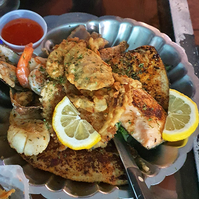 Key West seafood platter featuring succulent shrimp and perfectly cooked fish &ndash; ocean treasures transformed into a feast fit for coastal royalty.