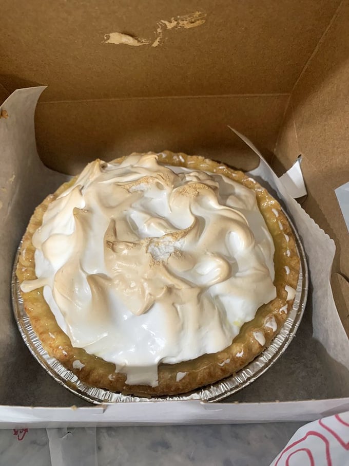 Lemon meringue with towering peaks of toasted sweetness that look almost too beautiful to destroy with a fork.