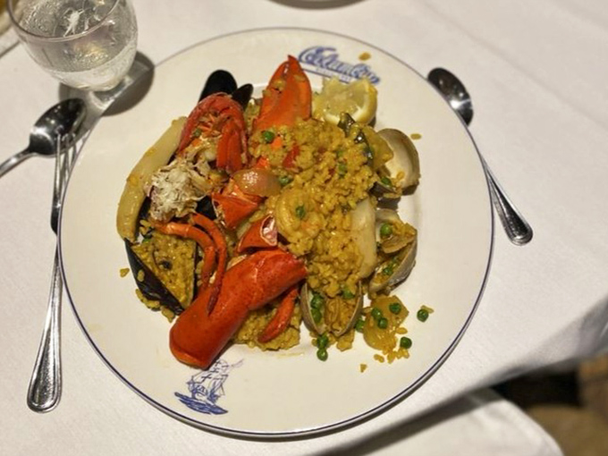 Paella Marinera arrives like an edible treasure chest from the sea &ndash; saffron-kissed rice topped with the ocean's finest offerings.