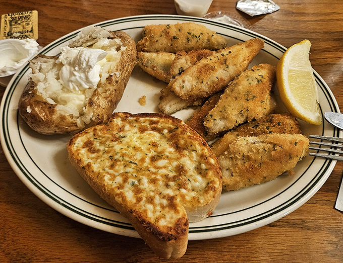 Delicate Canadian walleye, pan-fried to golden perfection, flakes at the mere suggestion of your fork &ndash; Lake Michigan's finest catch on a plate.