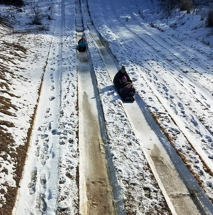 These specially designed tracks turn ordinary snow tubes into vehicles of pure joy, sending riders spinning and laughing all the way down.