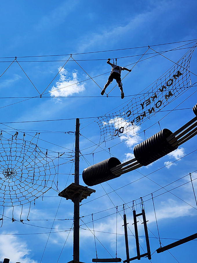 Navigating the horizontal cargo net requires a unique combination of determination, upper body strength, and creative vocabulary when you get stuck.
