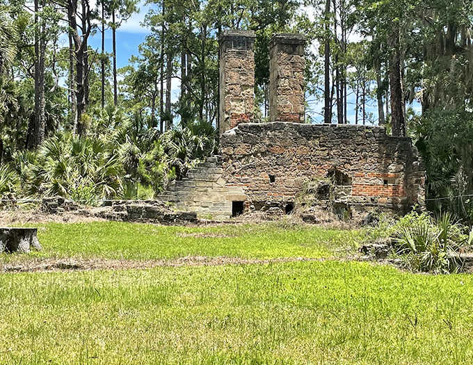 The Dummitt Plantation ruins whisper tales of Florida's past, where sugar production once ruled before nature reclaimed its throne.