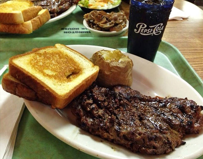 This NY strip steak with its buttery baked potato and golden Texas toast isn't just dinner &ndash; it's therapy on a plate.