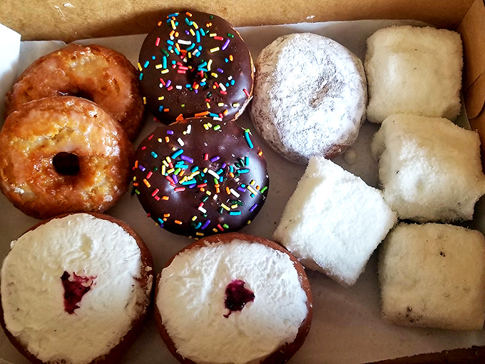 Simple pleasures done perfectly! Herman's glass case might not be fancy, but the donuts inside represent generations of baking expertise.