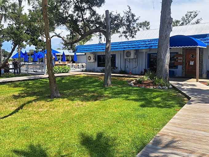 Blue umbrellas and waterside tables create the perfect setting for watching Crystal River's spectacular sunsets while enjoying dinner.