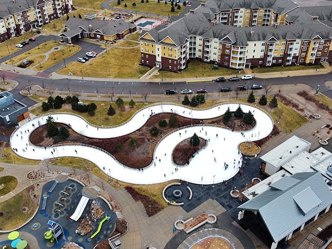This aerial perspective showcases the park's winding design, a frozen pathway that looks like someone drew it with the world's largest frosting tube.