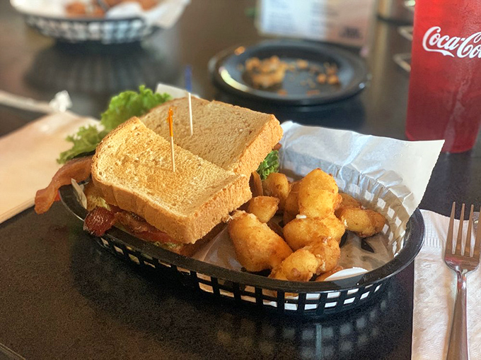 The humble BLT elevated to art form &ndash; crispy bacon, garden-fresh lettuce and tomato on toasted bread, with cheese curds that squeak with Wisconsin pride.