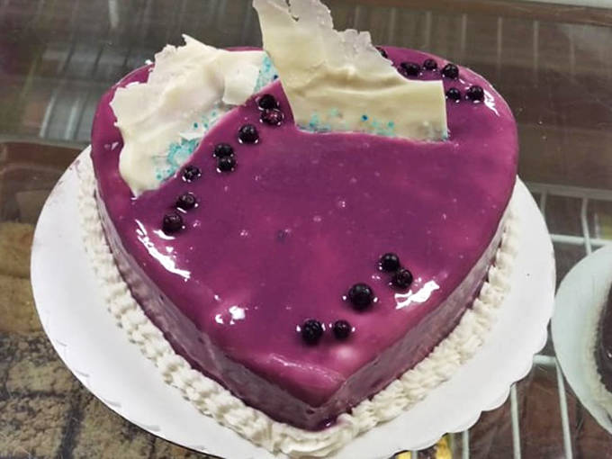 This heart-shaped blueberry cheesecake isn't just dessert &ndash; it's a love letter written in cream cheese and fruit, sealed with a glossy purple kiss.