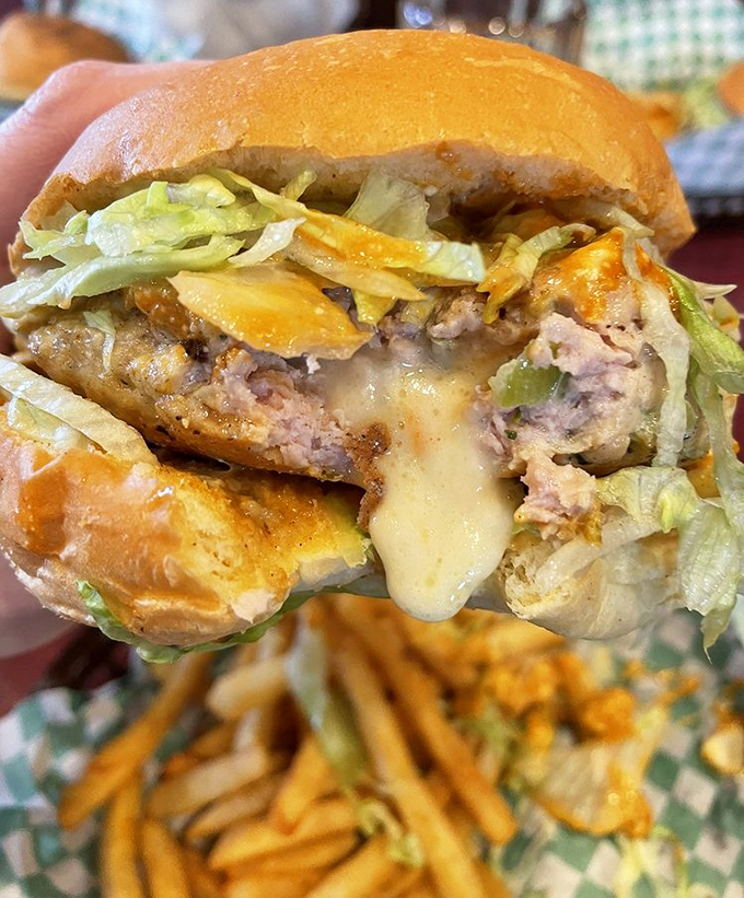 This Buffalo Chicken Juicy Lucy brings the heat with buffalo sauce and cooling bleu cheese &ndash; proof that chicken can play the stuffed burger game too.