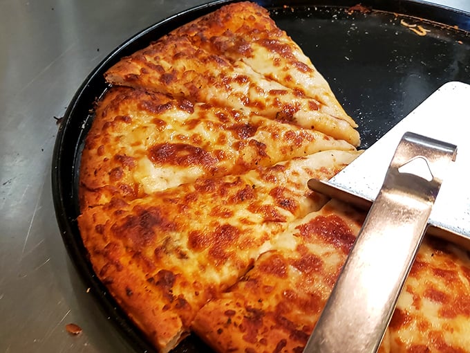 Pizza perfection in its simplest form &ndash; a cheese pie with the ideal balance of crispy and chewy, ready to silence even the loudest hunger pangs.