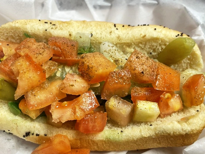 A proper Chicago dog is like a well-balanced orchestra&mdash;each ingredient playing its part in perfect harmony, from sport peppers to that essential pickle spear.