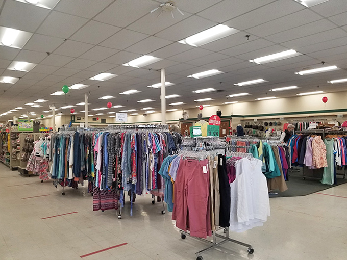 Festive touches brighten the clothing department, where seasonal celebrations transform the shopping experience throughout the year.