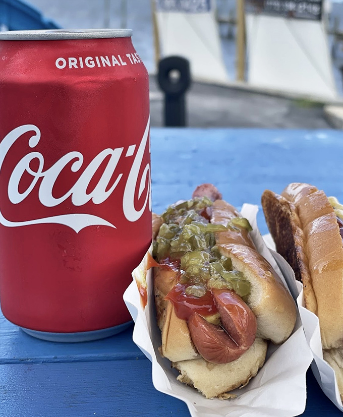 Coke: The classic companion to any proper hot dog feast &ndash; ice-cold Coca-Cola in aluminum, as the hot dog gods intended.