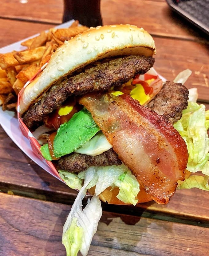 Del Gordo Doble Burger: This magnificent monster of a burger, complete with bacon and avocado, isn't just a meal—it's a commitment.