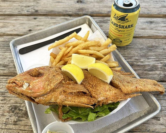Fresh catch of the day, fried to golden perfection, served with fries and cold beer – Florida living distilled to its essence.