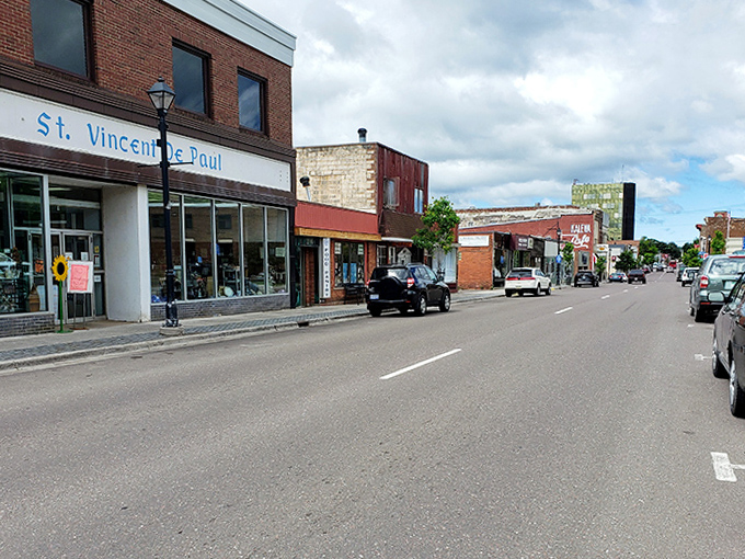 Main Street maintains its small-town charm with locally-owned shops that proudly display both American and Finnish flags during cultural celebrations.