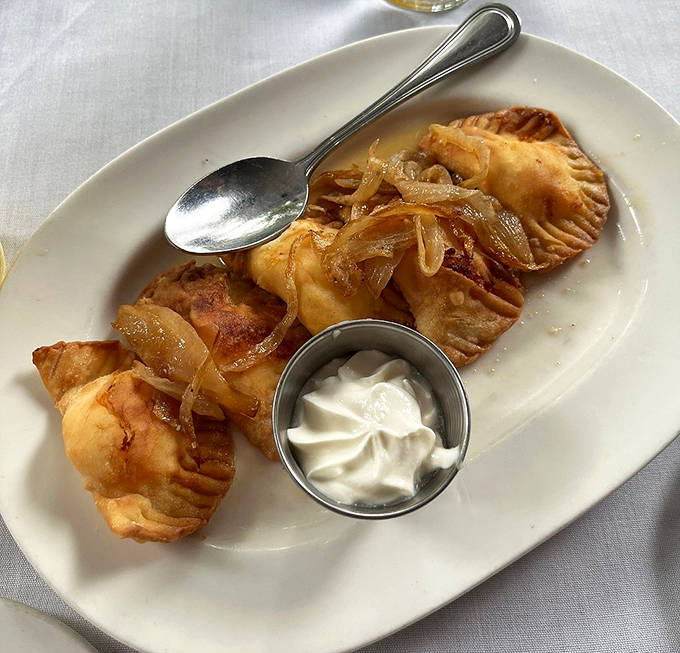 These pierogi dumplings pay homage to Northeast Minneapolis' Eastern European roots &ndash; golden-fried pockets of potato goodness topped with caramelized onions and a dollop of nostalgia.