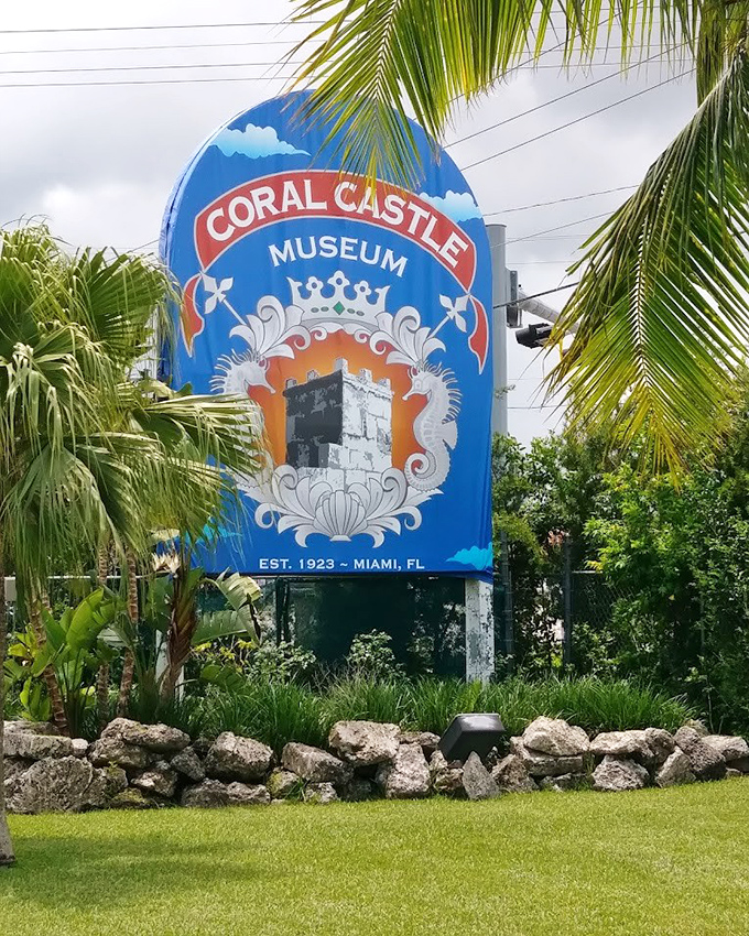 The iconic Coral Castle Museum sign welcomes curious minds to one of Florida's most bewildering attractions.
