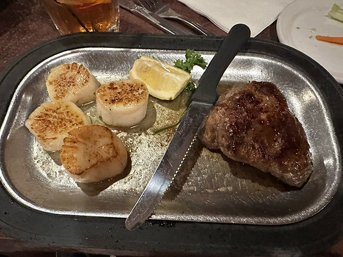 Surf meets turf in perfect harmony &ndash; a tender steak alongside plump, caramelized scallops that would make coastal restaurants jealous.