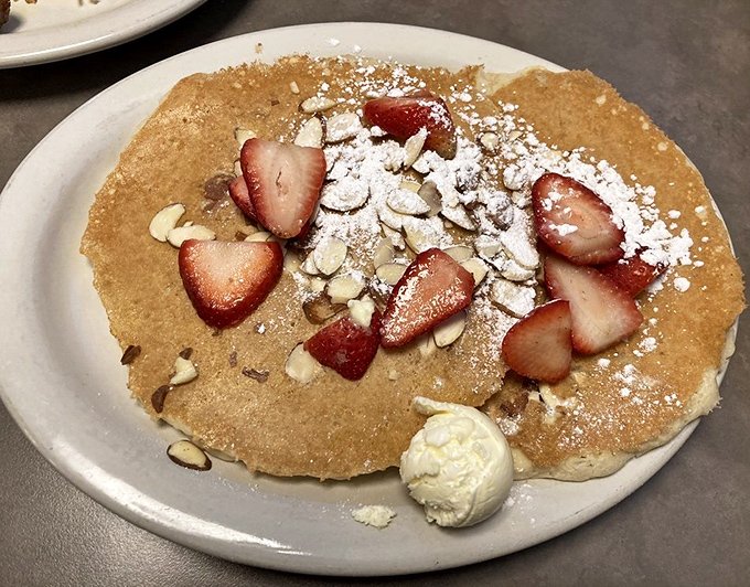 Strawberry Almond Pancakes: These fluffy discs topped with fresh strawberries and slivered almonds aren't just named after a song – they're a chart-topping breakfast hit.