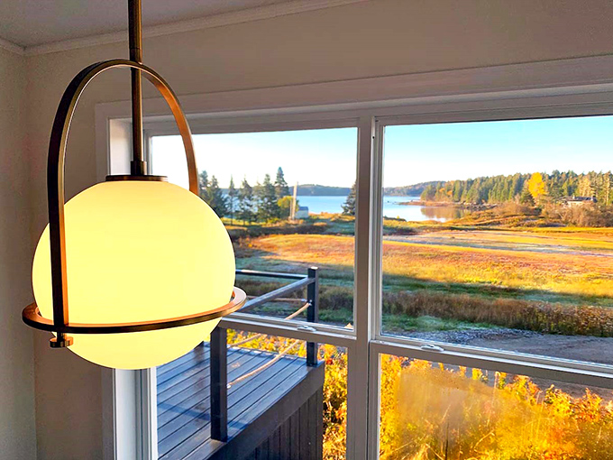 Every window tells a different story of Maine's coastal beauty, with light that changes hourly like nature's own mood ring.