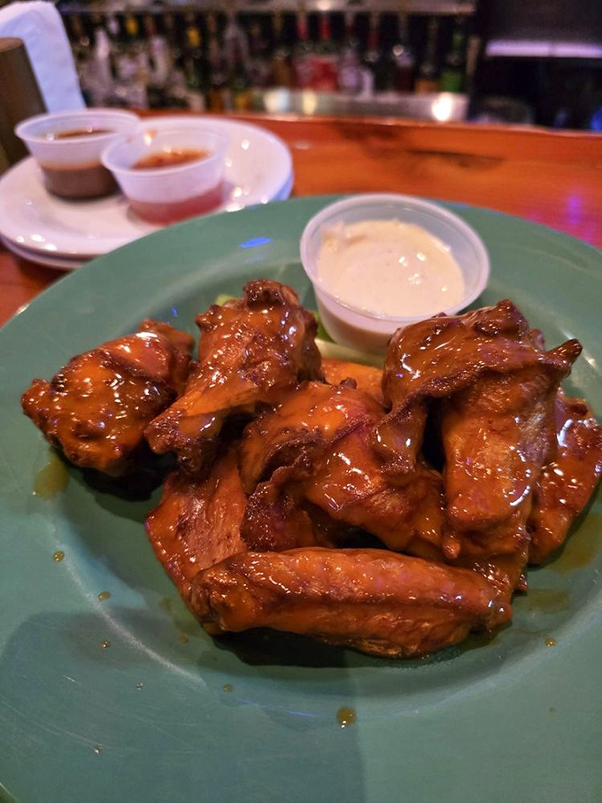These wings aren't flying anywhere except straight to your taste buds, glazed with sauce that strikes the perfect balance between sweet and heat.