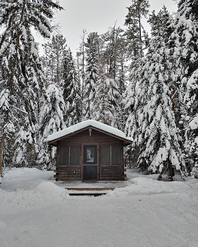 This cozy cabin in winter looks like the setting for either a peaceful retreat or a mystery novel, hopefully the former.