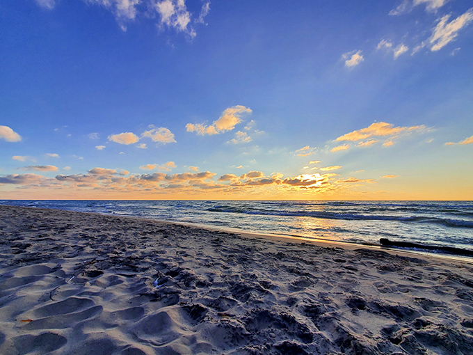 As day bids farewell, the sun paints the sky in impossible colors, turning beach glass hunting into a magical twilight pursuit.