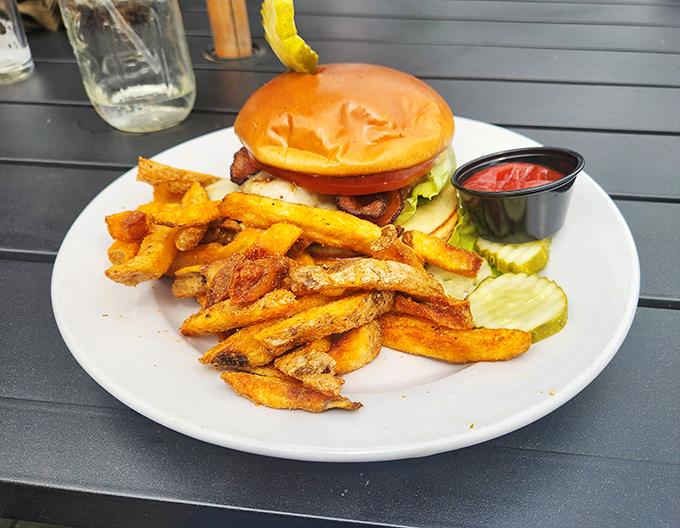 A burger that demands to be photographed before it's devoured, accompanied by hand-cut fries that could steal the show on their own.
