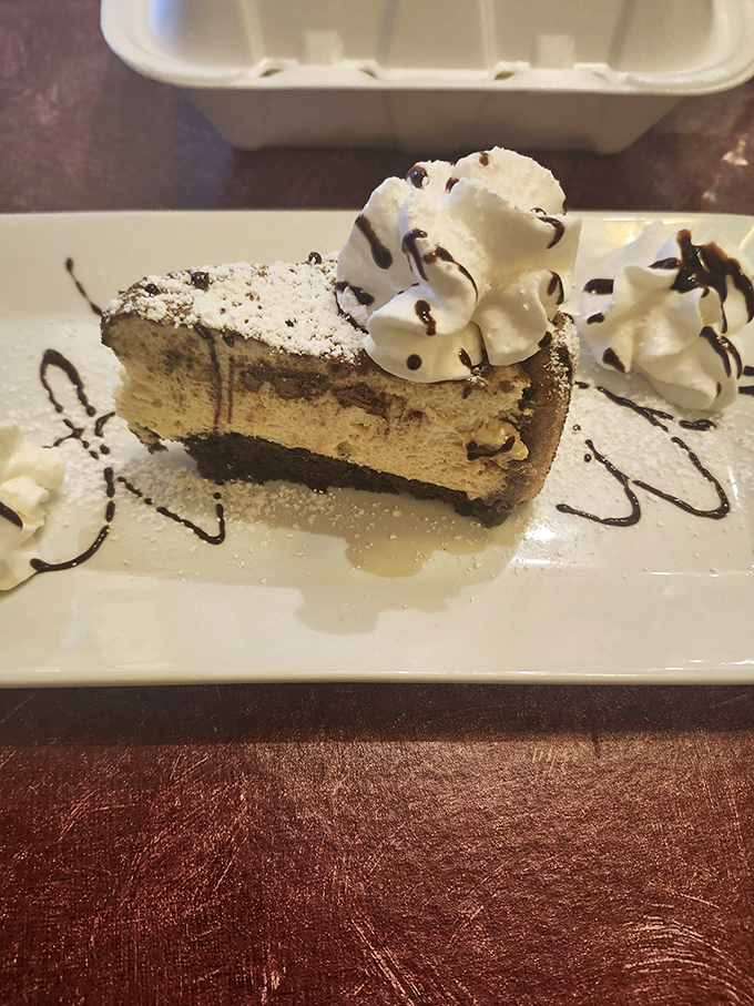 A slice of heaven featuring layers of chocolate decadence topped with clouds of whipped cream &ndash; the sweet finale that makes you forget you're "too full."