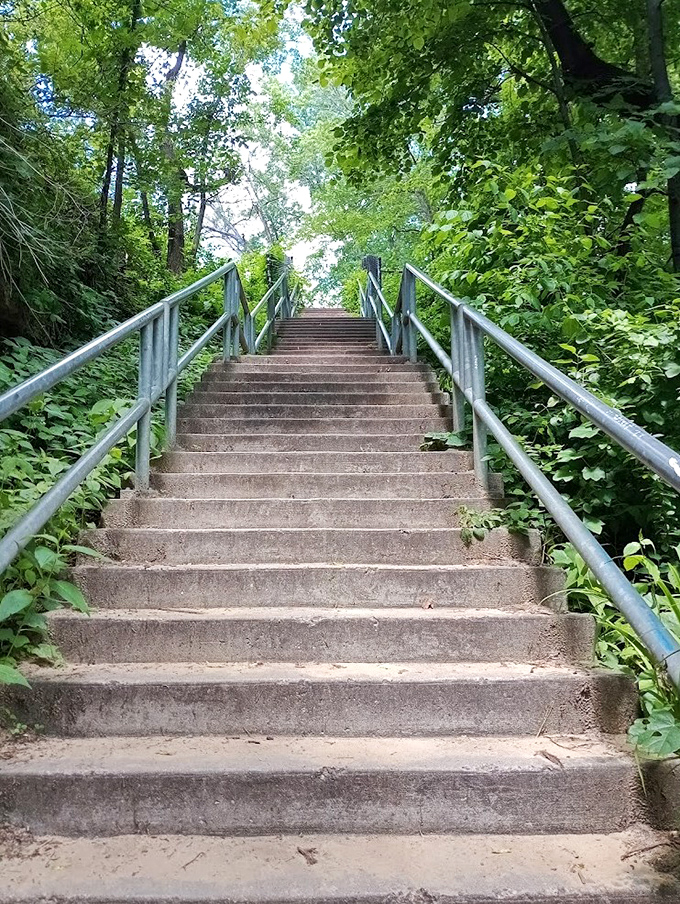 These concrete steps aren't just a pathway &ndash; they're a portal between everyday life and the hidden wonders waiting below.
