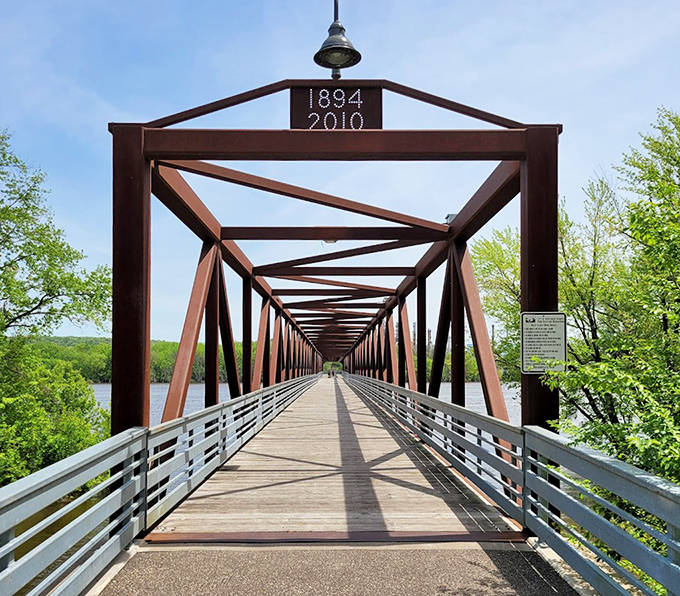 Engineering marvel turned recreational treasure &ndash; the swing bridge's distinctive rust-colored trusses frame the perfect river panorama.