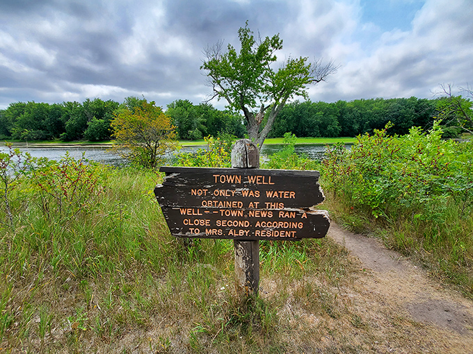 This rustic sign marks the town well, where water quality apparently ran "a close second" to a local resident's supply.