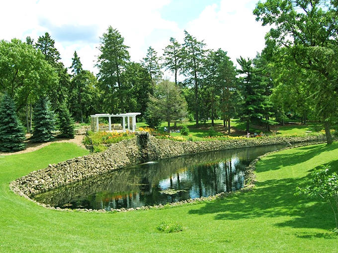 The Japanese Garden pond mirrors the sky perfectly &ndash; nature's own Instagram filter creating double the beauty without a single hashtag.