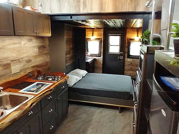 Rest easy in our queen-sized bed, perfectly tucked into the caboose interior for the ultimate snug sleeping experience.