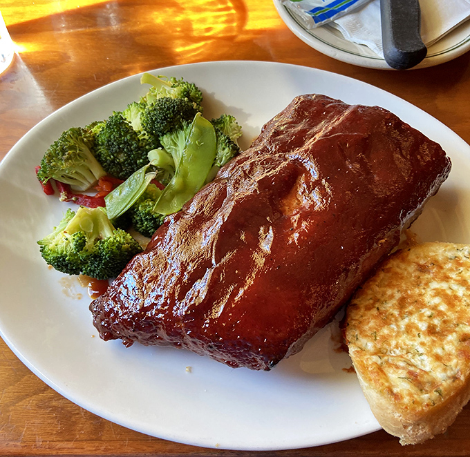 Glistening with sweet-savory glaze, these fall-off-the-bone tender ribs make you forget about table manners and embrace your inner caveperson.