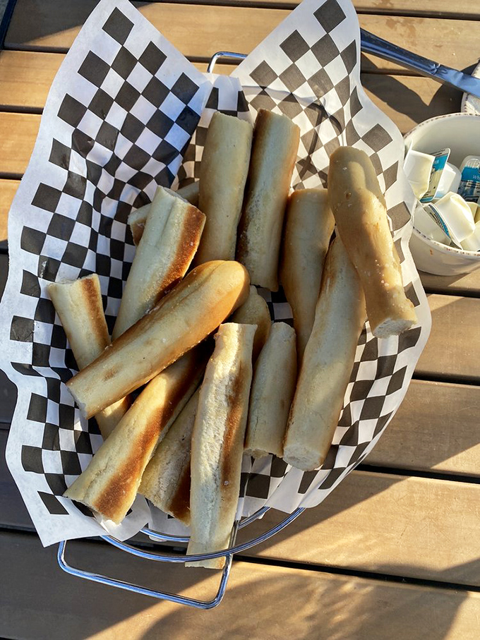 Breadsticks that have achieved cult status &ndash; golden, garlicky wands of joy that could make a carb-counter weep with temptation.