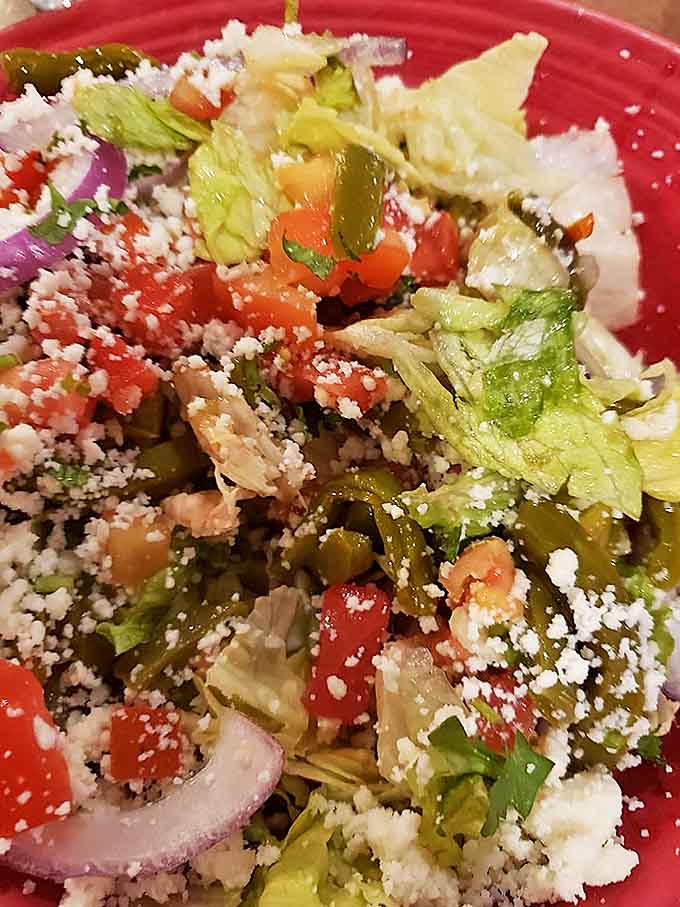 This isn't just any salad – it's a celebration of nopales (cactus), tomatoes, and queso fresco that brings the bright, tangy flavors of Mexican markets to Minnesota.