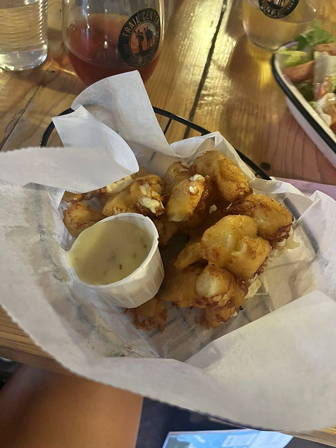 Golden, crispy cheese curds that squeak with Wisconsin pride but taste like pure Minnesota magic.